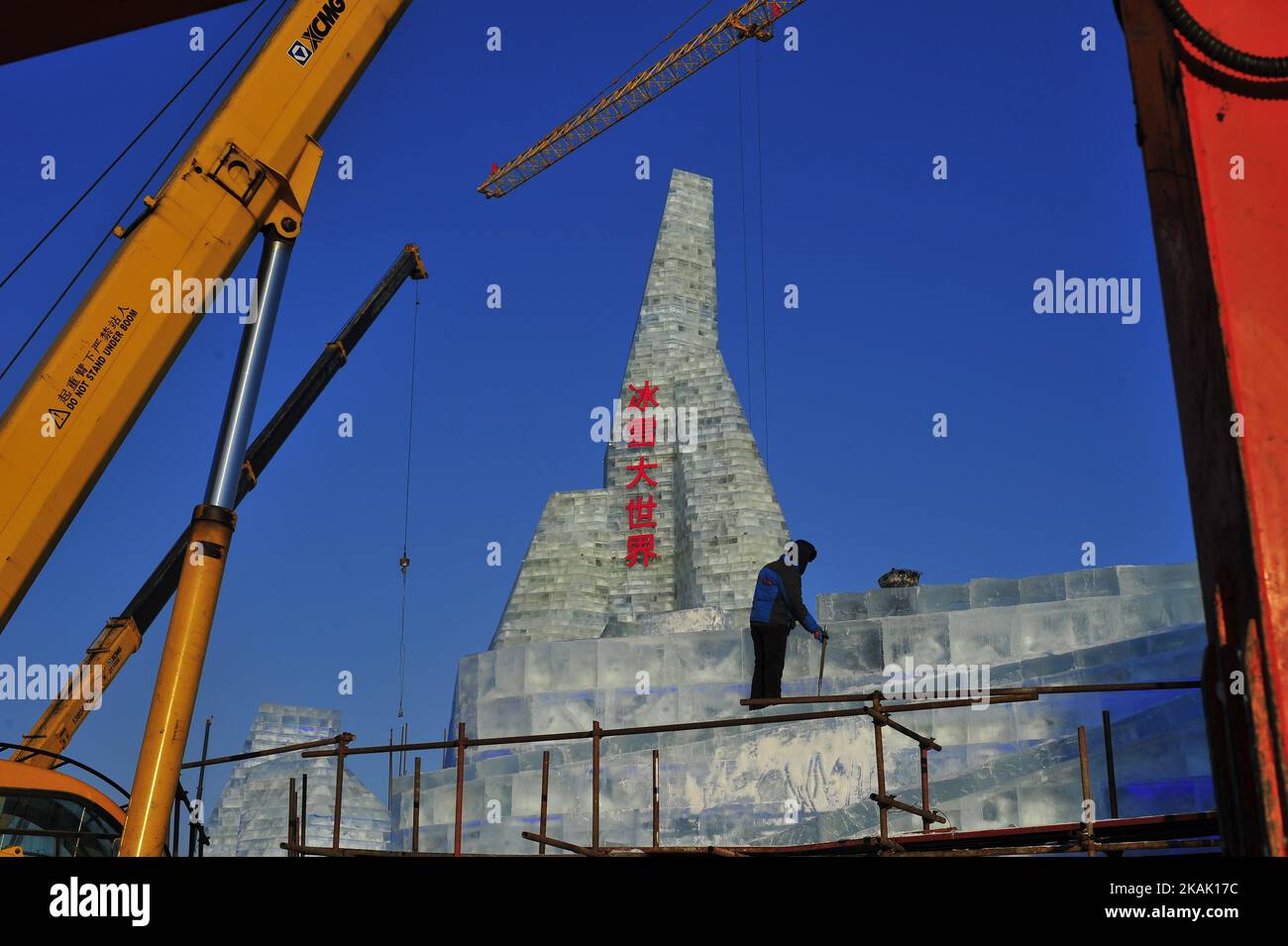 Harbin residents building ice sculpture at ice and snow world in Harbin ...