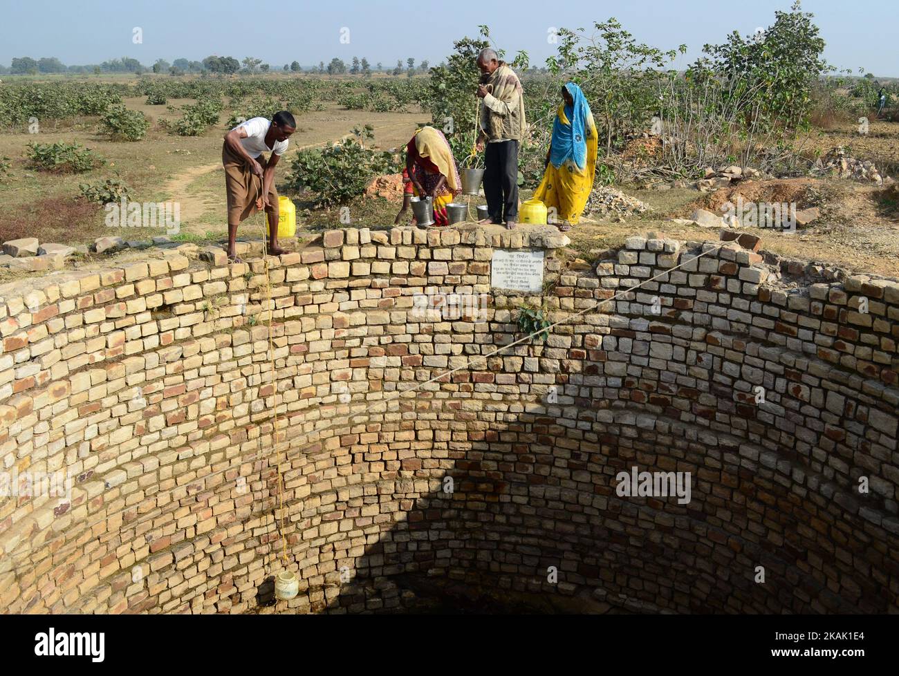 In this photograph taken on December 15,2016,Indian people of an ...