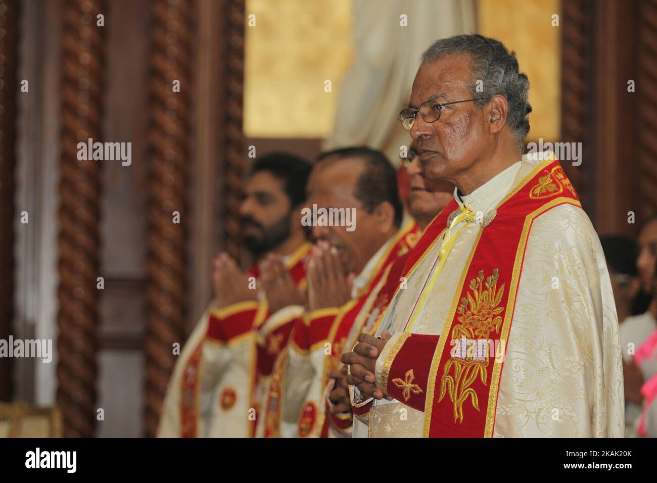 South Indian Catholic priests perform special prayers during the ...