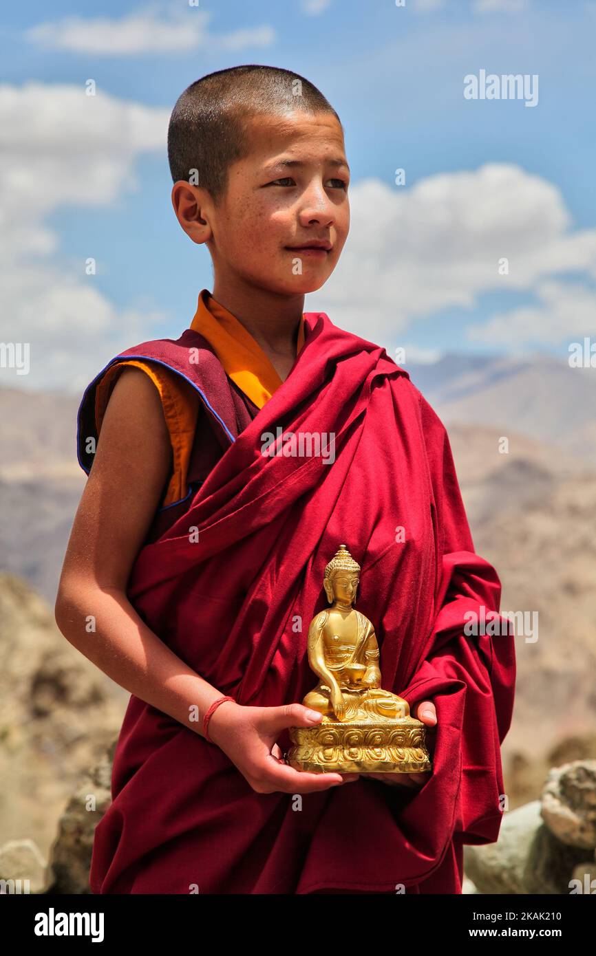 Young buddhist devotees buddha statue hi-res stock photography and ...