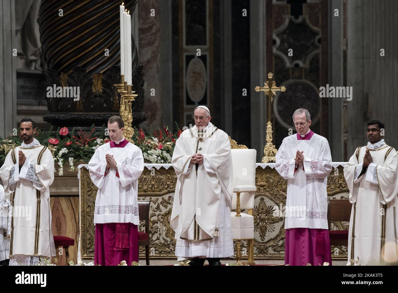 Pope Francis, background center, celebrates the Christmas Eve Mass in ...