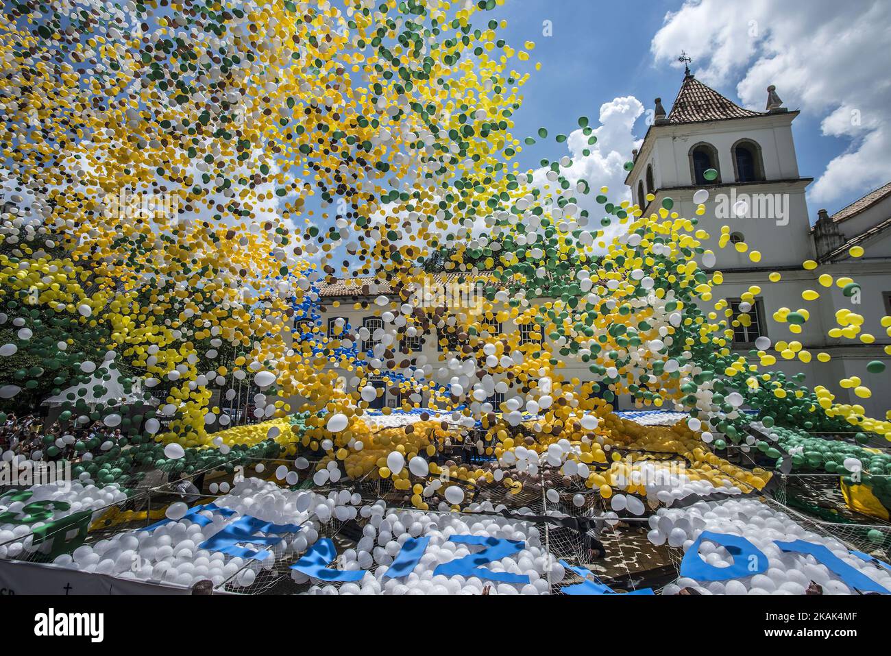 Balloons are released into the sky as part of the year-end celebrations ...