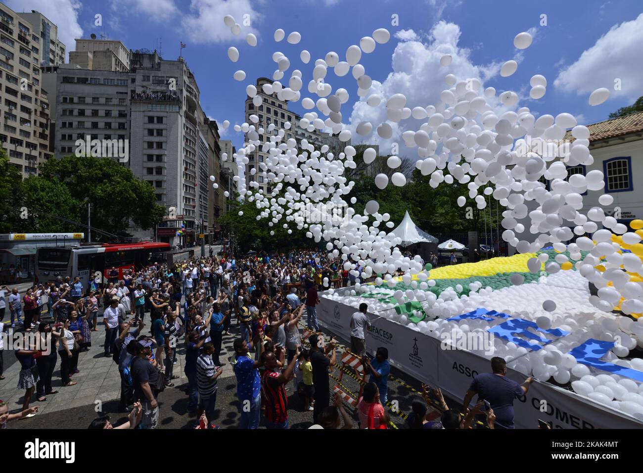 Balloons are released into the sky as part of the year-end celebrations ...