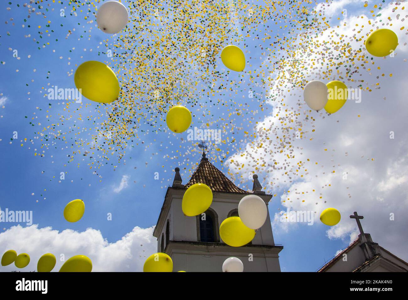 Balloons are released into the sky as part of the year-end celebrations ...