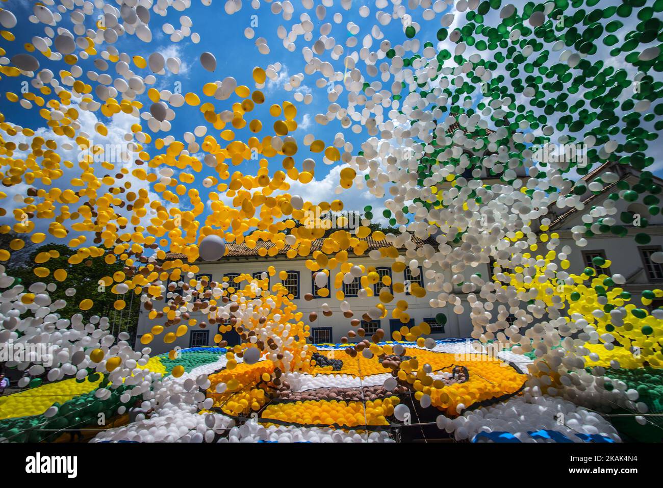 Balloons are released into the sky as part of the year-end celebrations ...