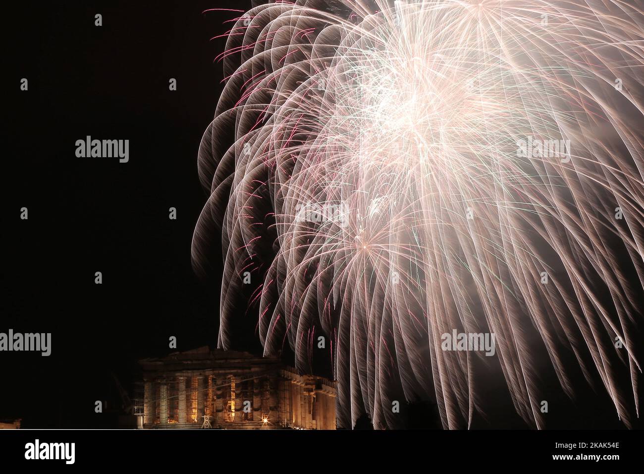 Fireworks explode over the Parthenon temple atop the Athens Acropolis ...