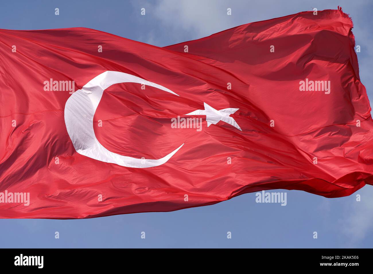 Turkish flag background. Red textile flag of Turkey on the streets of ...