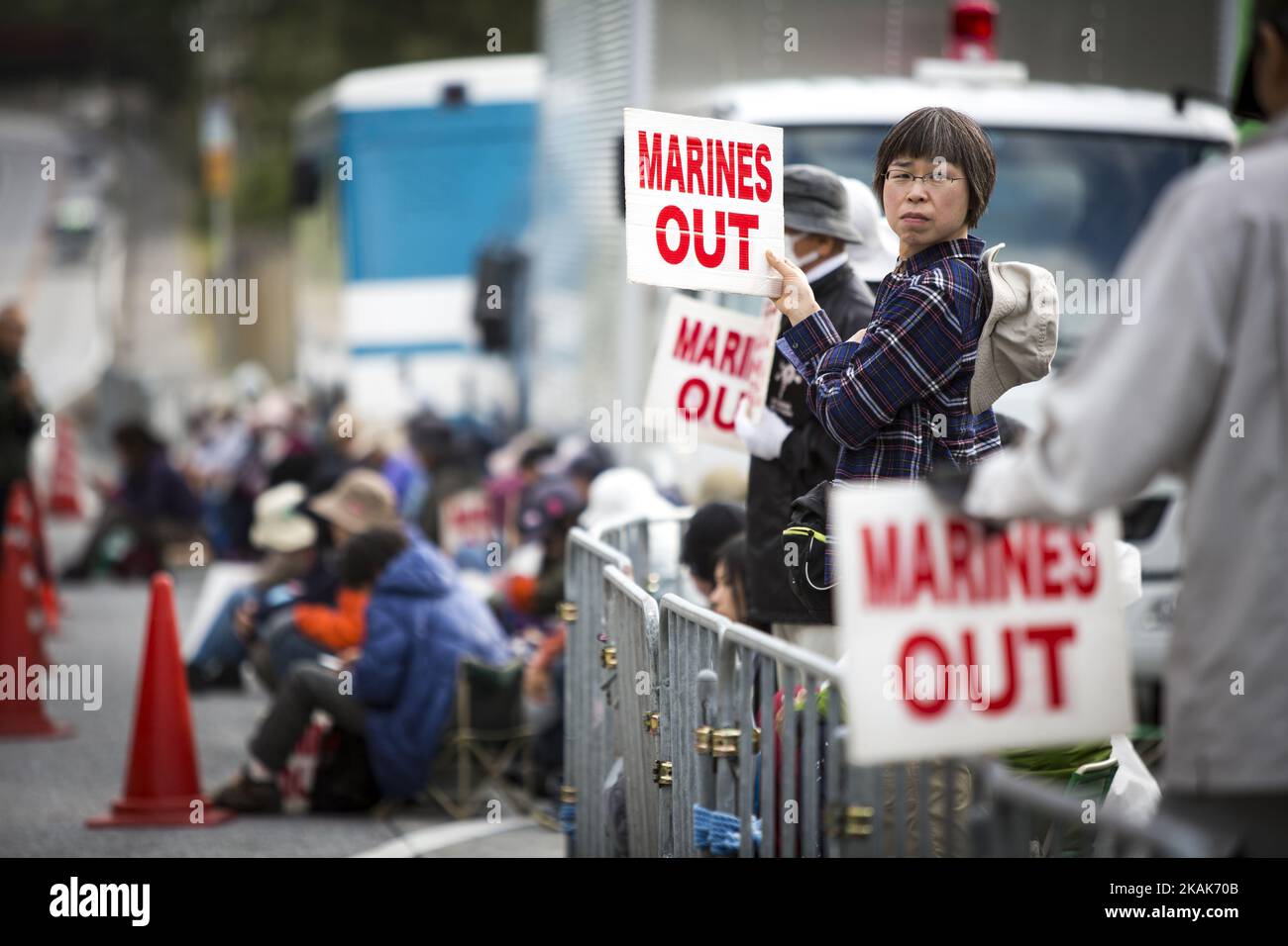 Anti U.S. Base relocation protesters stage a rally outside the Camp ...