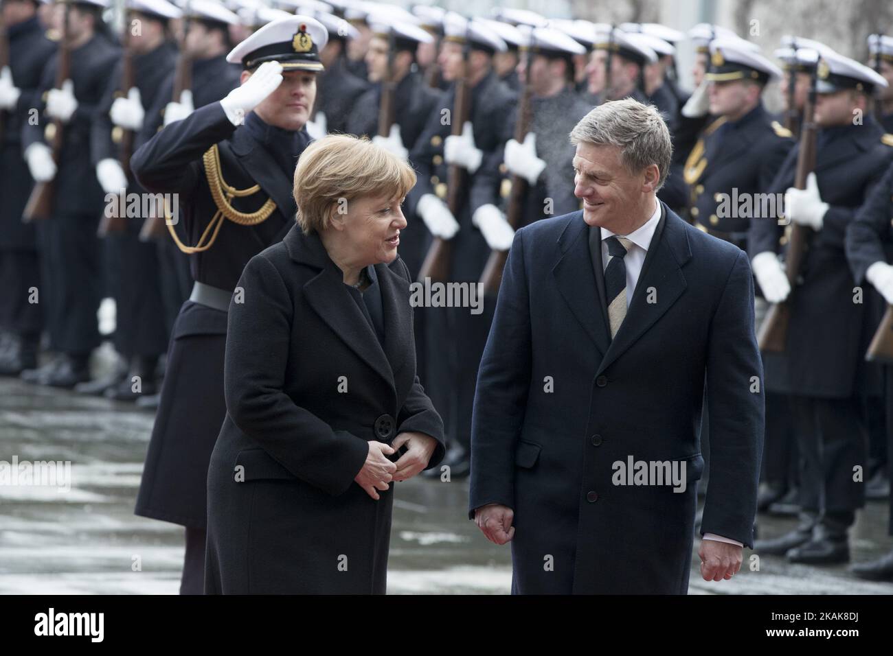 German Chancellor Angela Merkel chats with New Zealand's Prime Minister ...