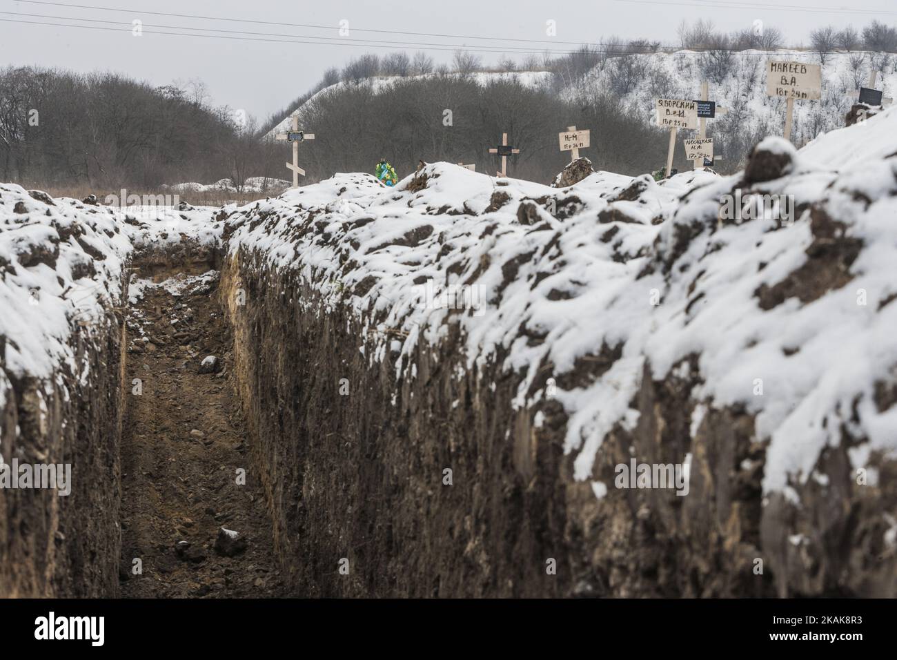 Hole for new graves in a DNR soldiers cemetery in Makiivka, Ukraine ...