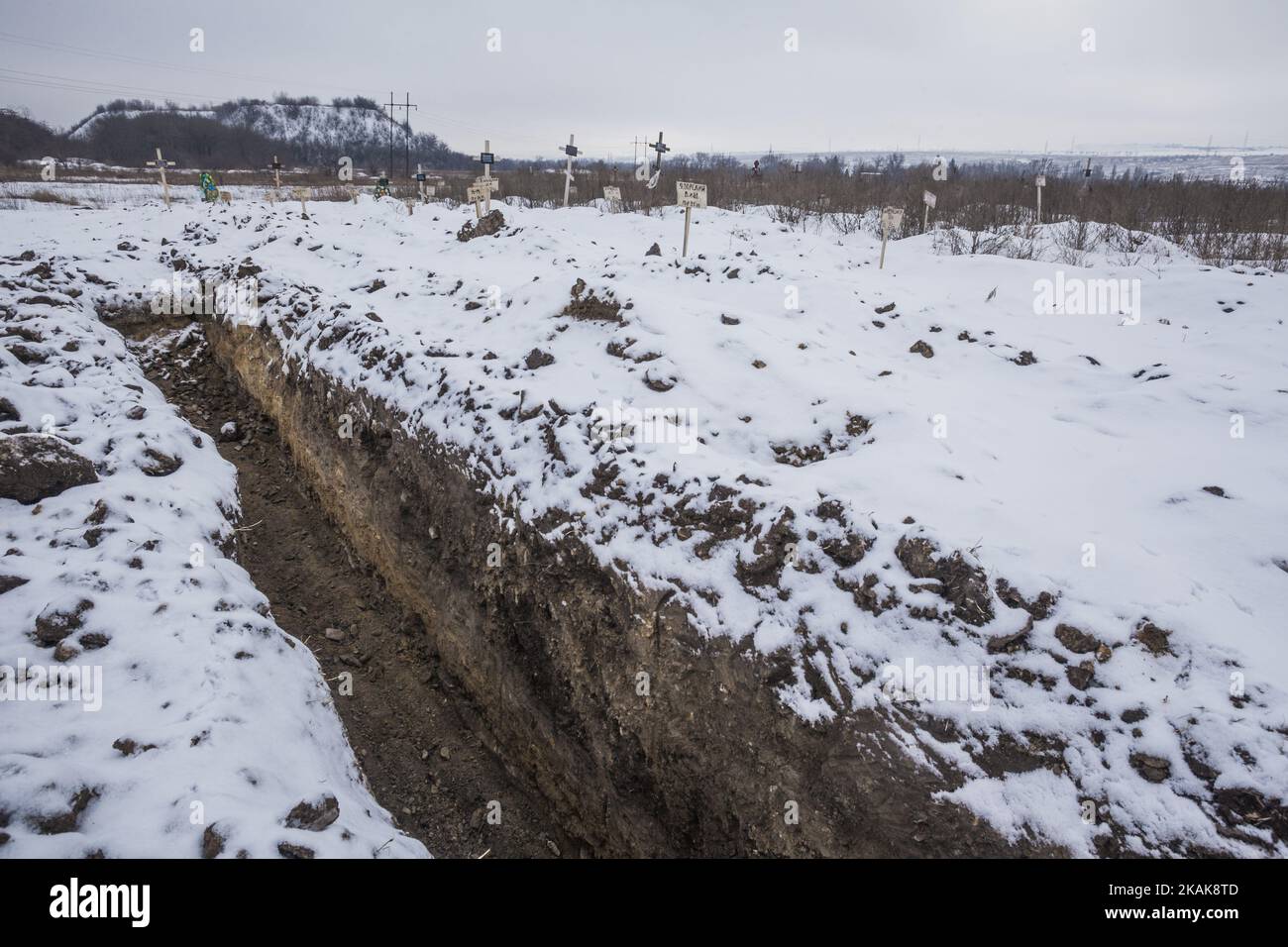 Hole for new graves in a DNR soldiers cemetery in Makiivka, Ukraine ...