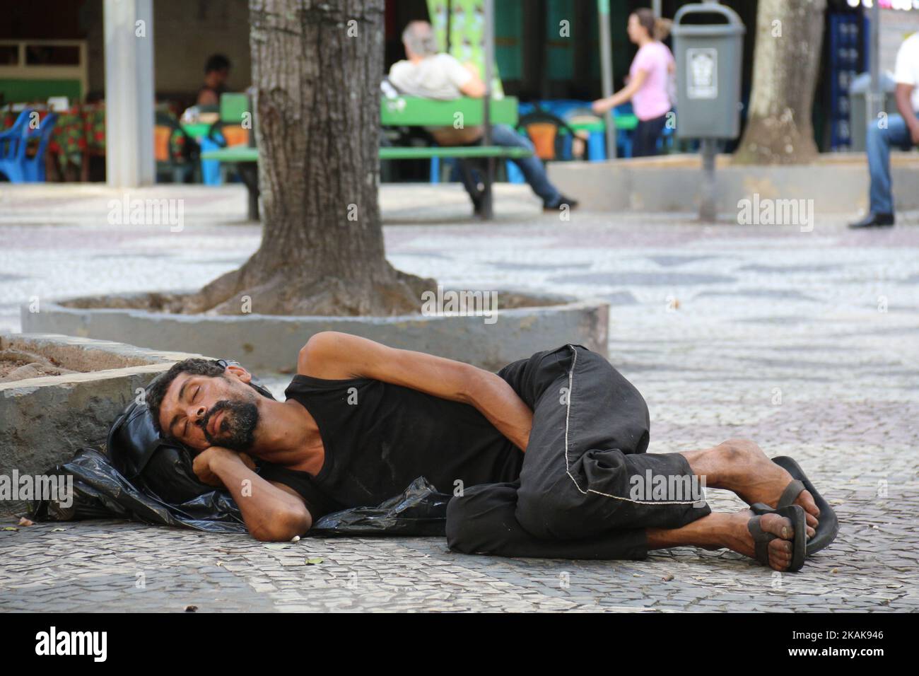 Man sleeps in a square in the City Center. Data released by the City ...