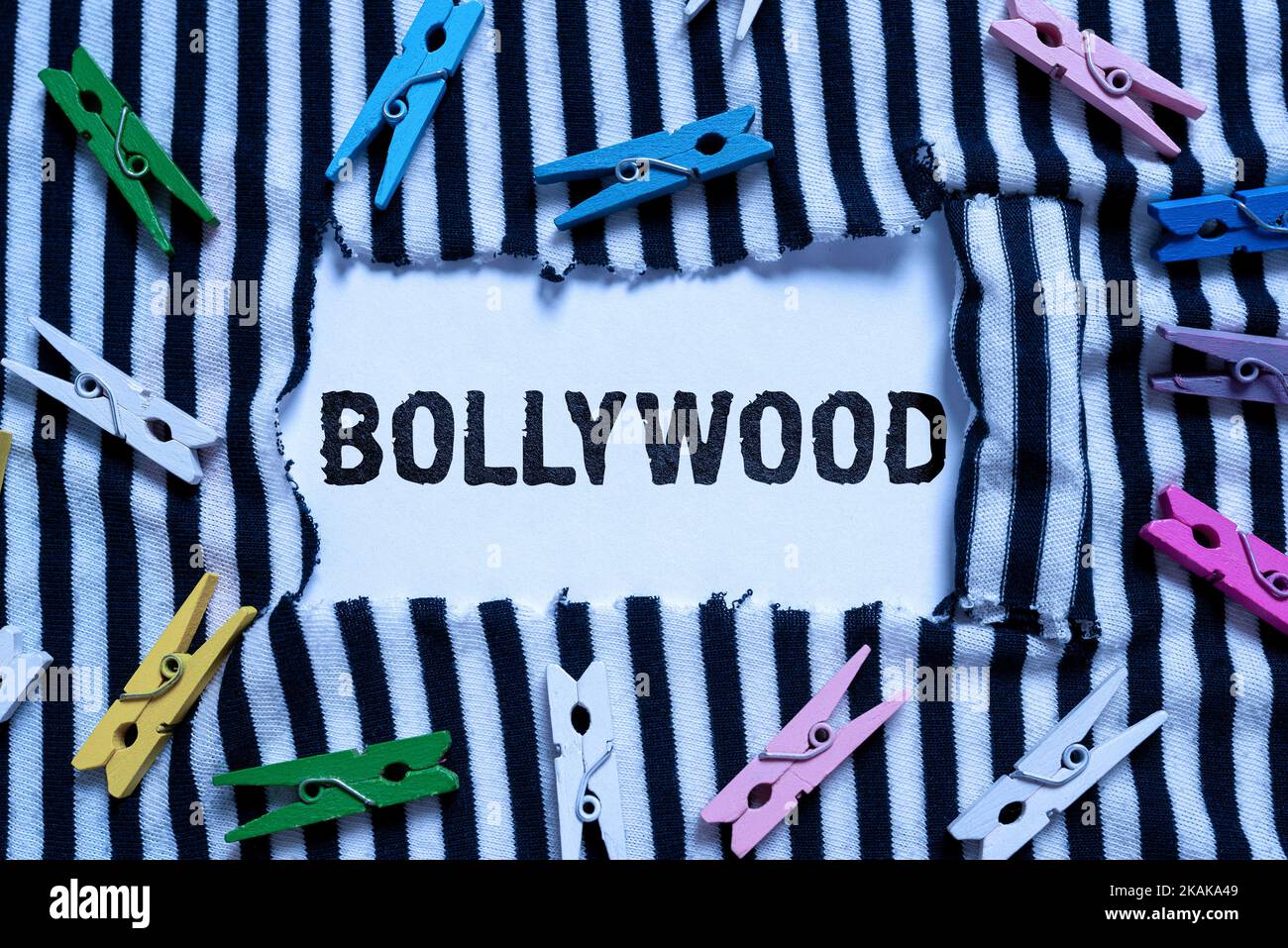 Hand writing sign Bollywood. Word Written on one who organizes and ...