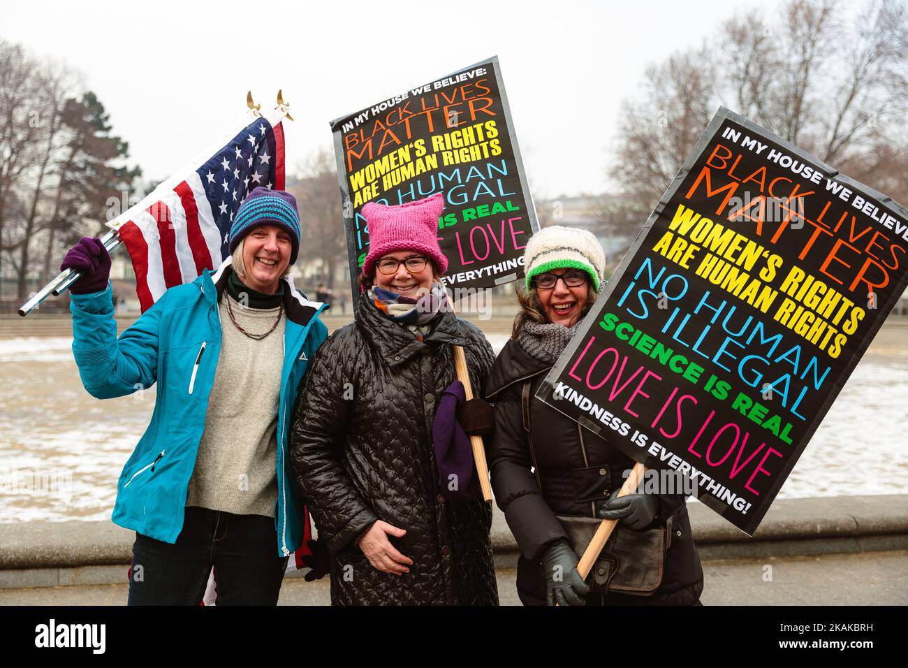 Women attend a protest for women's rights and freedom in solidarity ...
