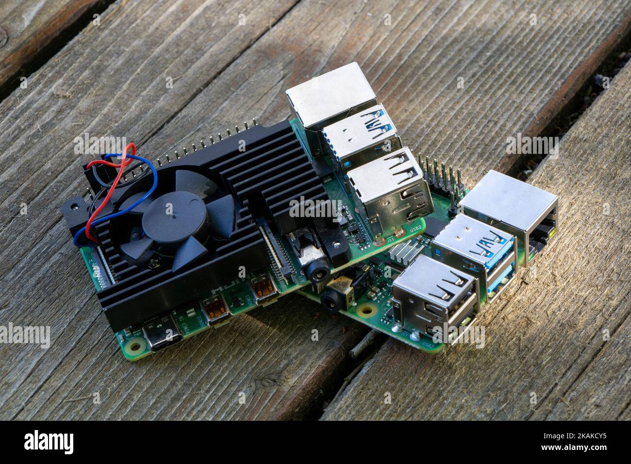 A Raspberry Pi Microcomputer 4B with a black heatsink for Electrical ...