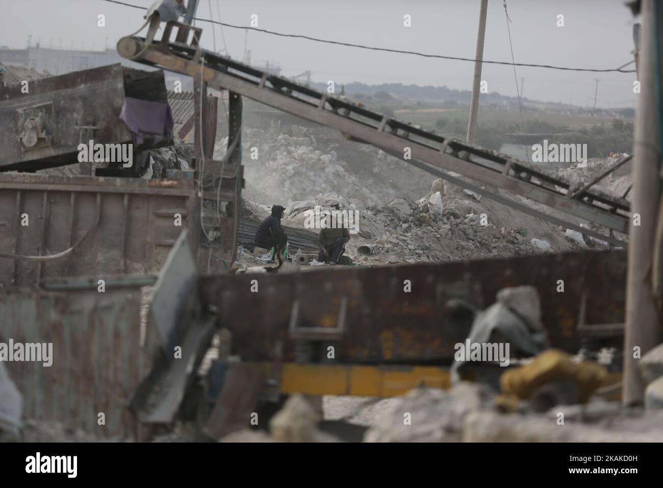 Palestinian workers at a factory that recycles rubbles of houses ...