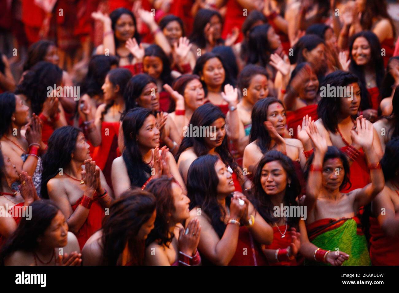 Devotees offer prayers before taking holy bath in the Bagmati river ...