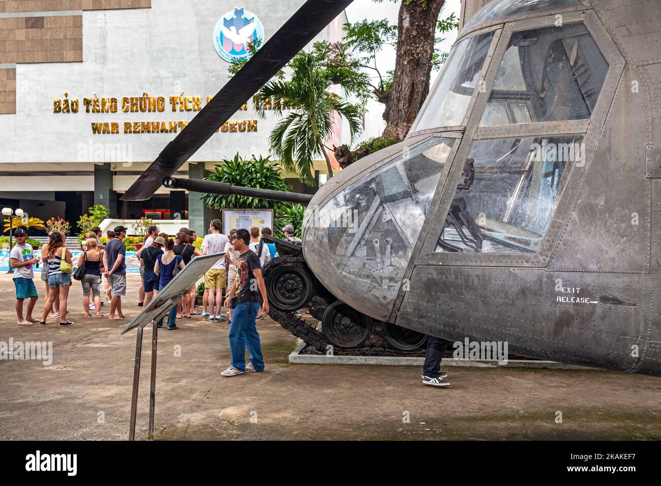 U.S. Army helicopter and visitors outside War Remnants Museum, Ho Chi ...