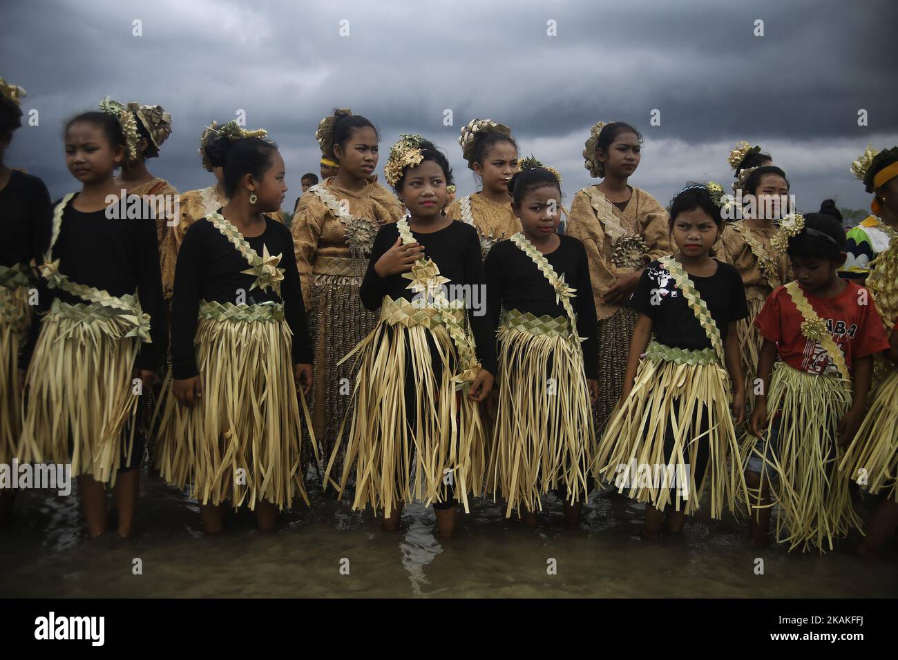 Members of the Mah Meri tribe wearing a traditional cloth before start ...