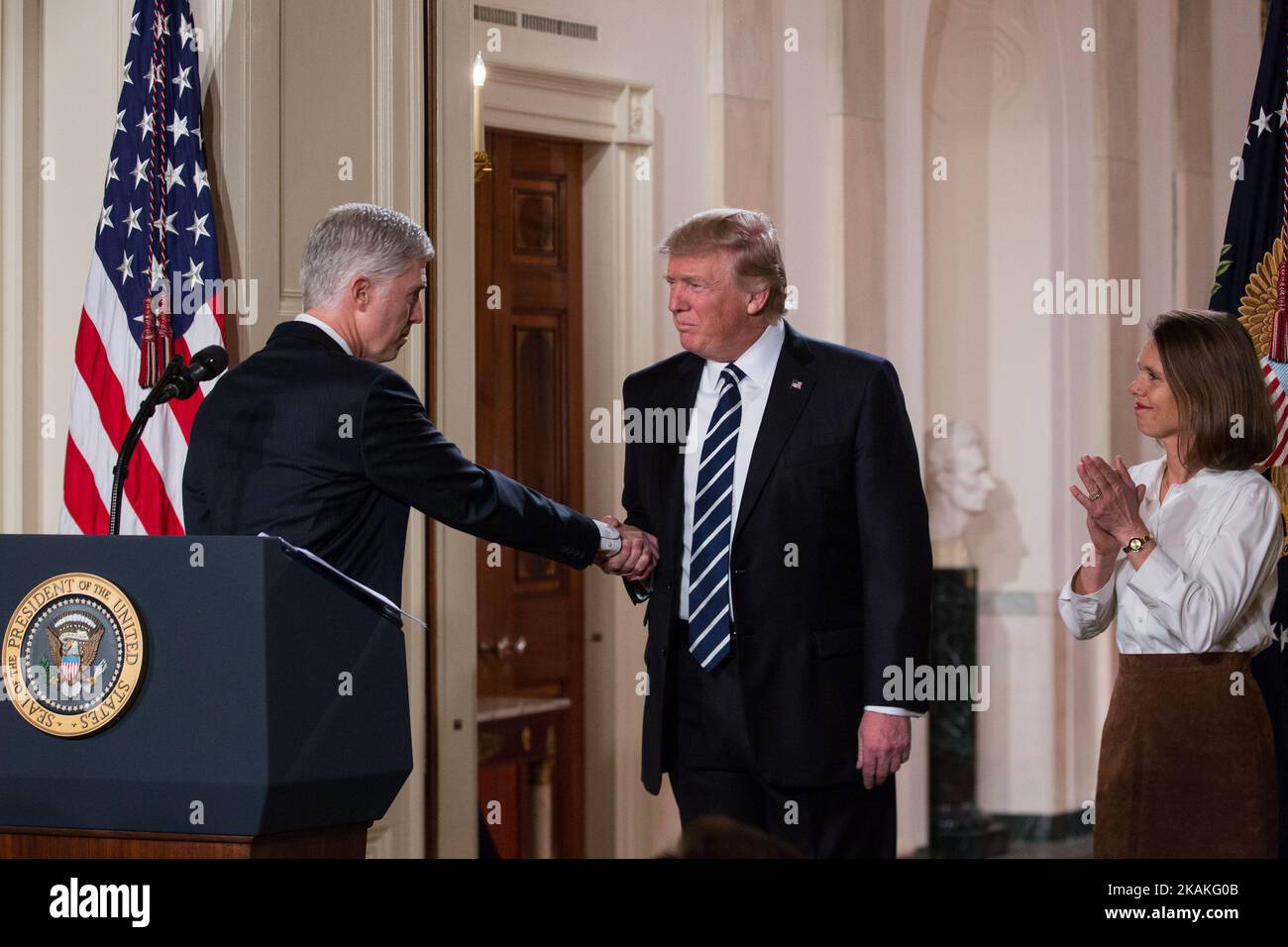 On Tuesday, January 31, (l-r), judge Neil Gorsuch shakes hands with U.S ...