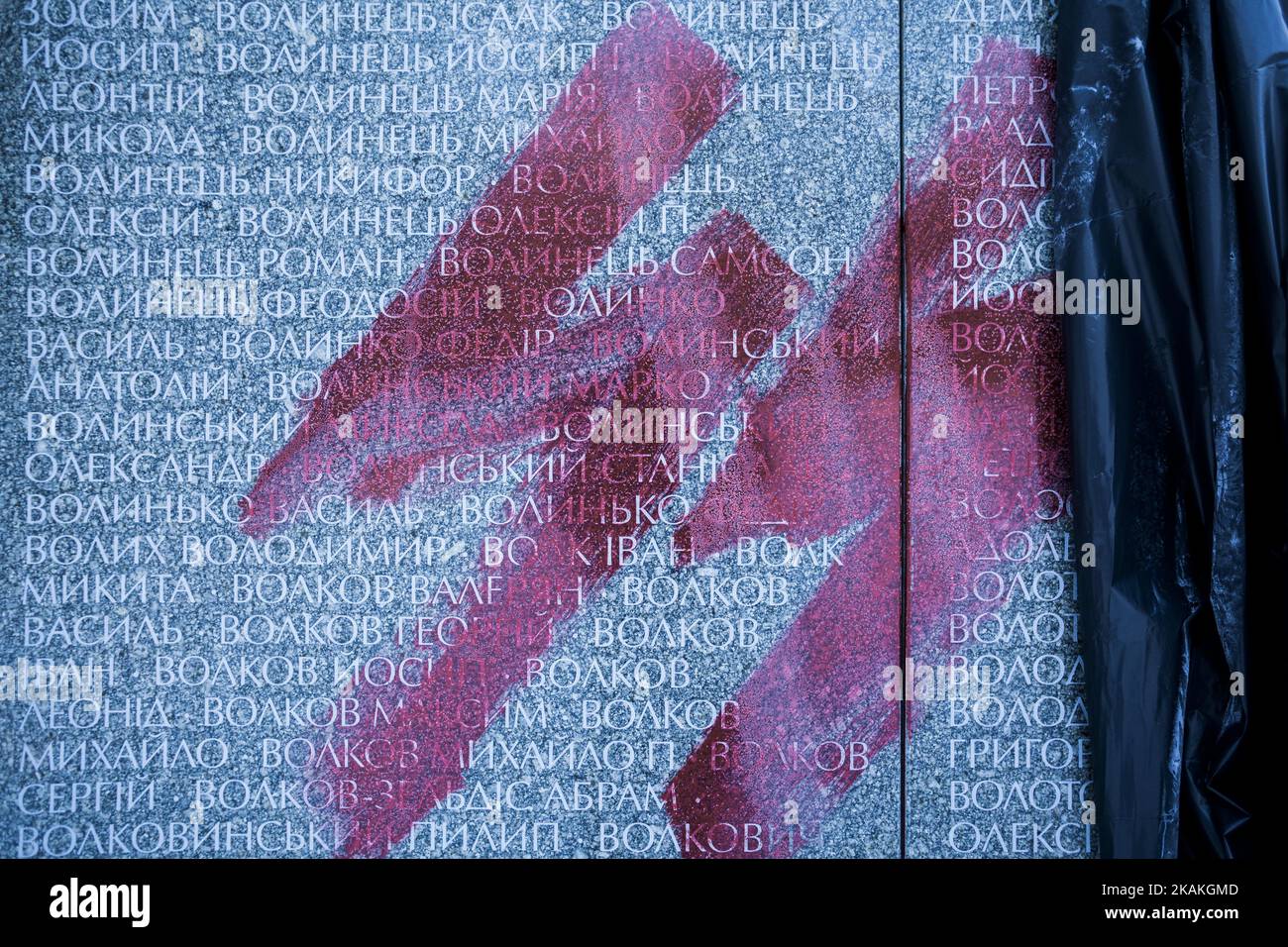 SS Nazi symbol painted on a memorial stone at the Bykivnia cemetery ...