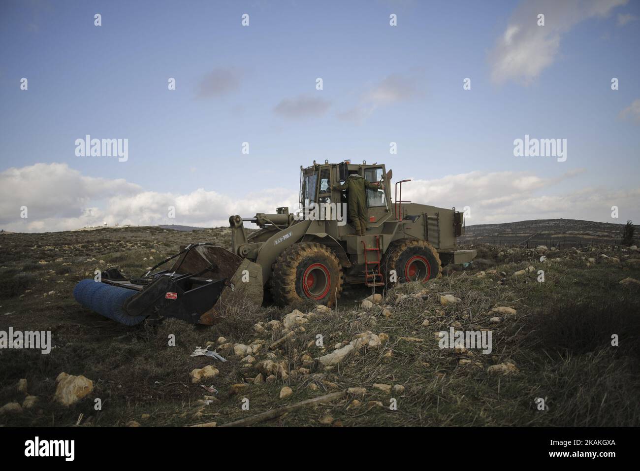 A soldier on a tractor is seen during an operation by Israeli forces to ...
