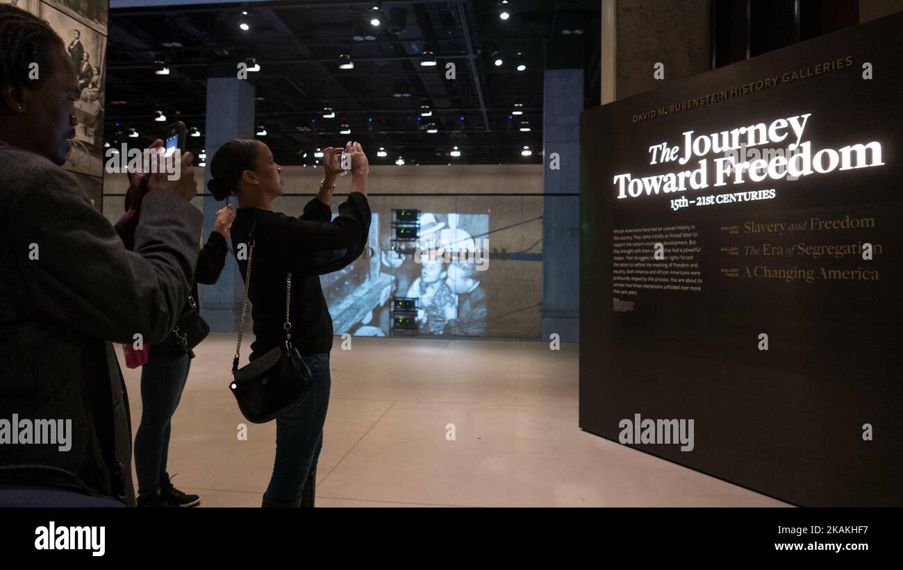 Guests tour the "Slavery & Freedom" exhibit at the Smithsonian's ...