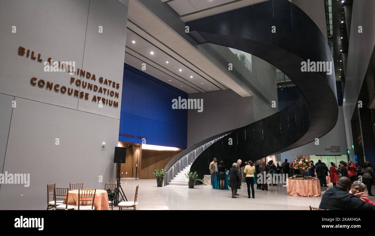 Guests enjoy a reception in the Bill & Melinda Gates Foundation ...