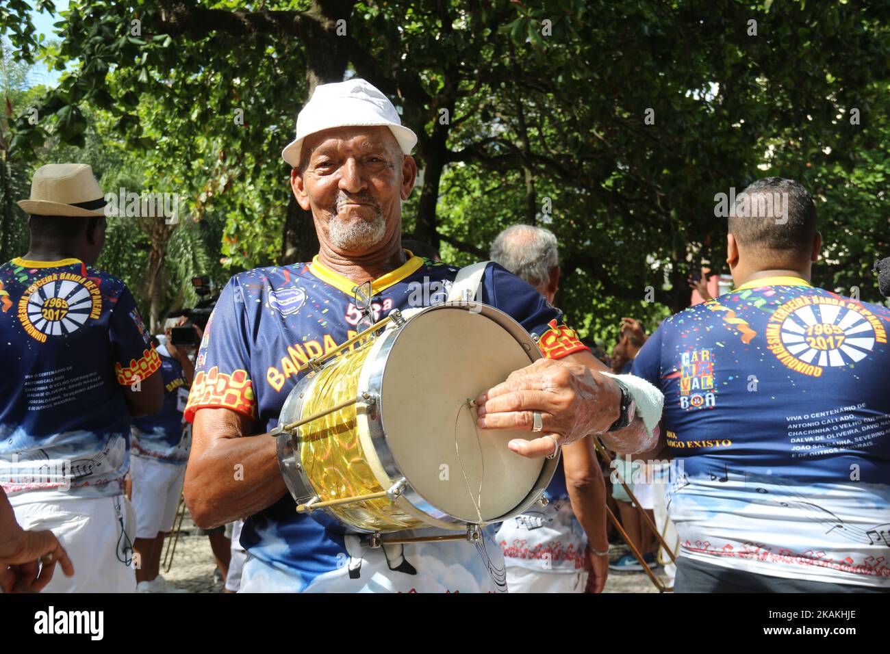 Man plays cuica, a traditional carioca carnival instrument during ...