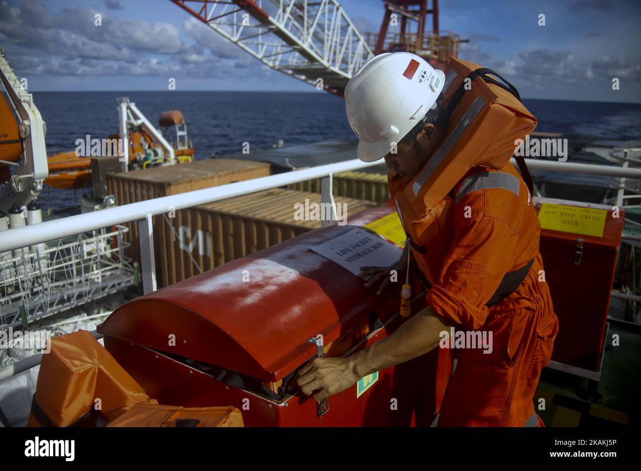 A Crew Member Is Seen At Deck Near The Life Boat During Abondon Ship