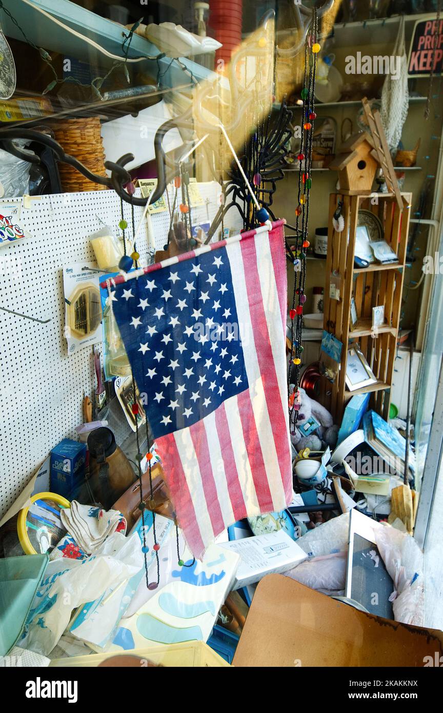 American flag in store front hi-res stock photography and images - Alamy