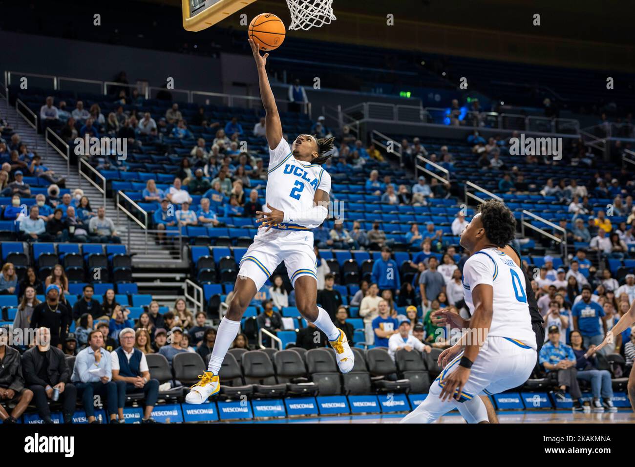 UCLA Bruins guard Dylan Andrews (2) scores on a layup during a NCAA men ...