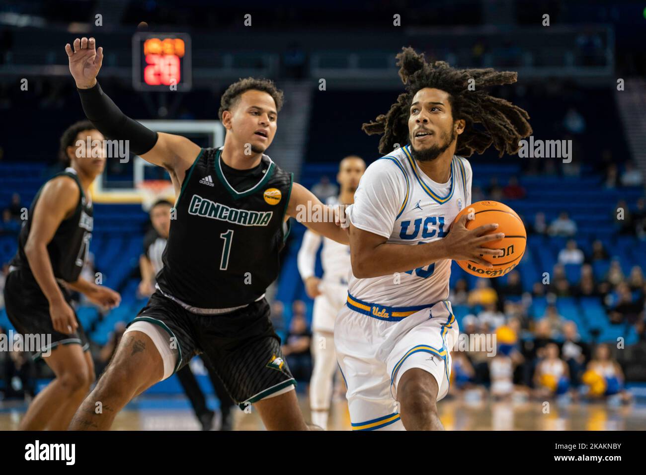 UCLA Bruins guard Tyger Campbell (10) drives against Concordia Golden ...