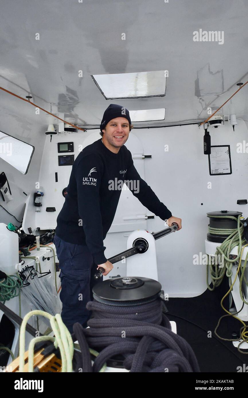 Skipper Arthur Le Vaillant poses for photos aboard the sailboat "Mieux ...