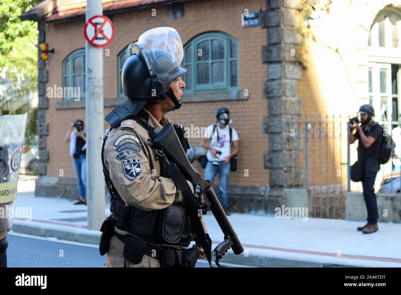 Police officers use non-lethal weapons, morale bombs and tear gas to ...