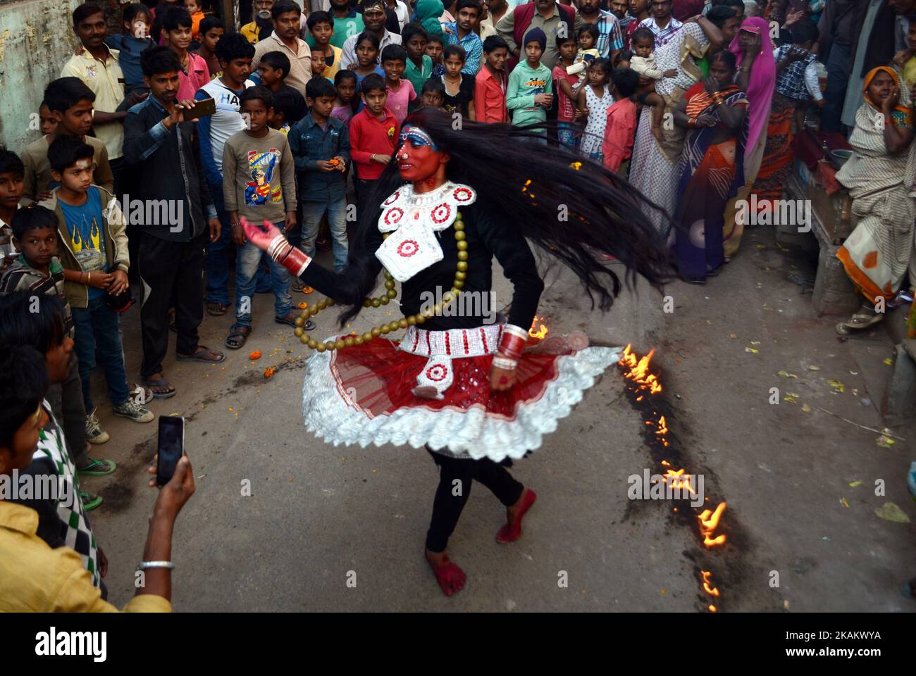 An indian artist, dressed as hindu Goddess Shakti, performs during Maha ...