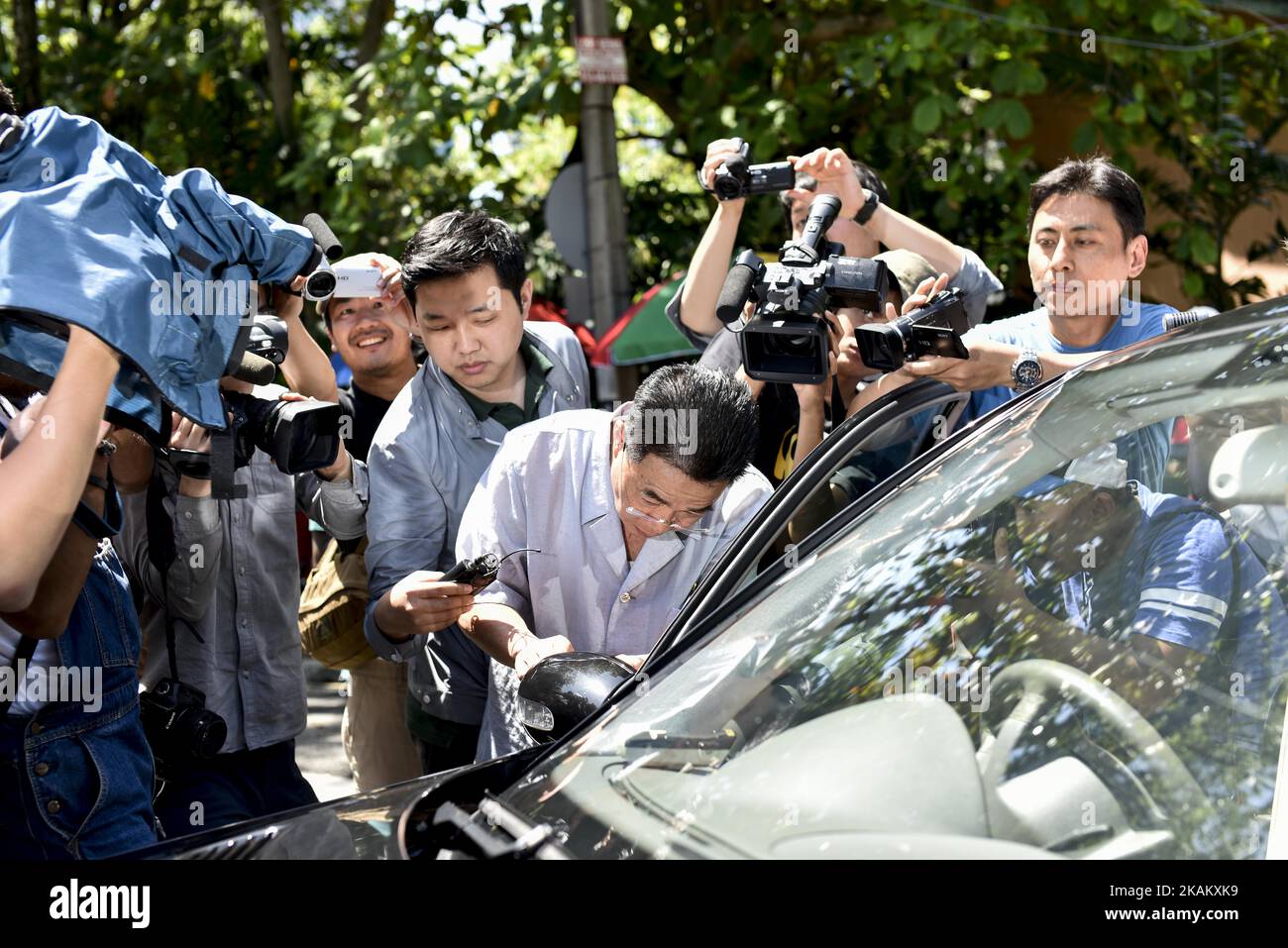 A consul of North Korean embassy Kim Yoo-sung is checking his car side ...