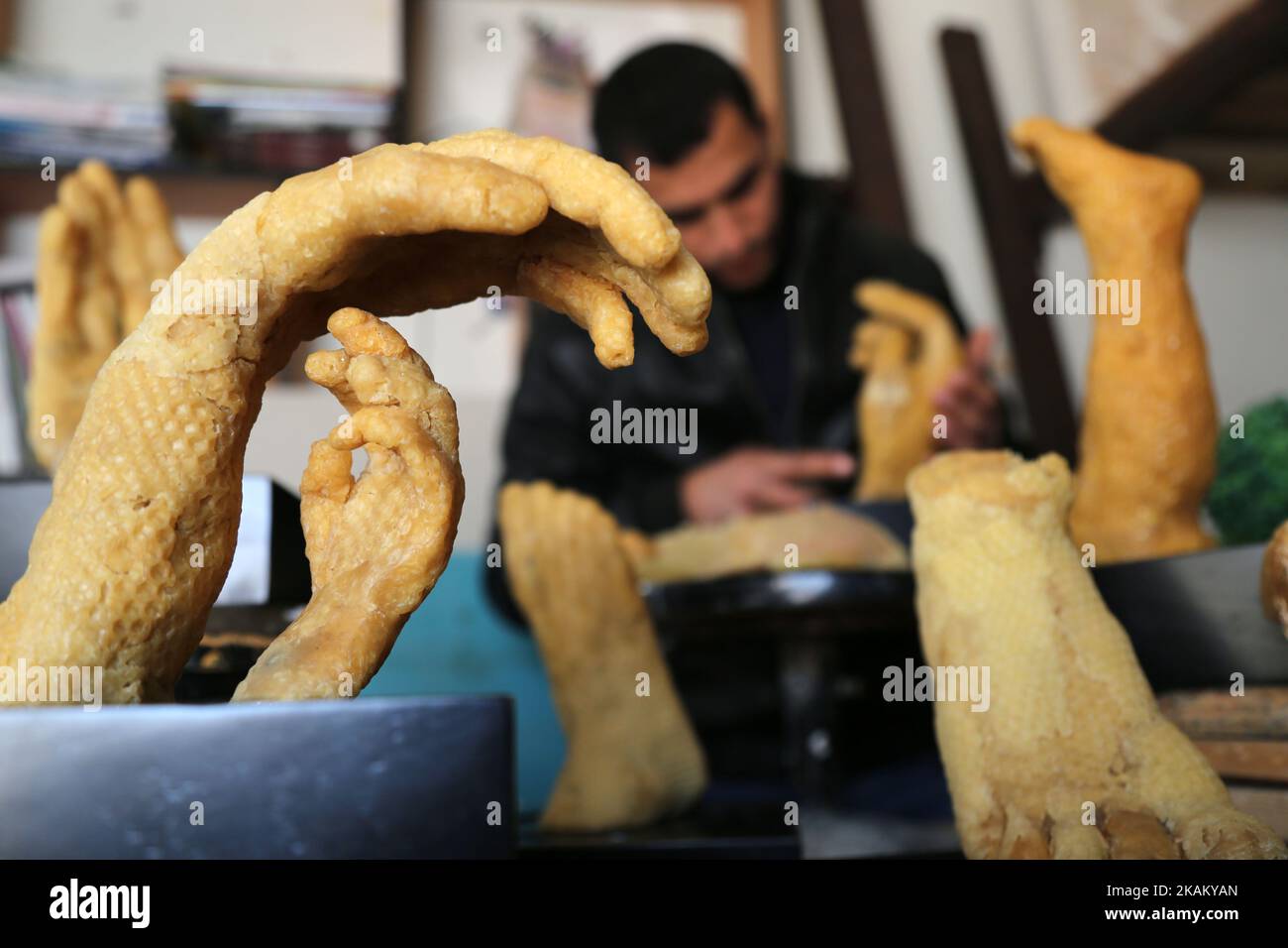 Palestinian artist, Mohammed Abu Hashish, 29, uses beeswax to produce ...