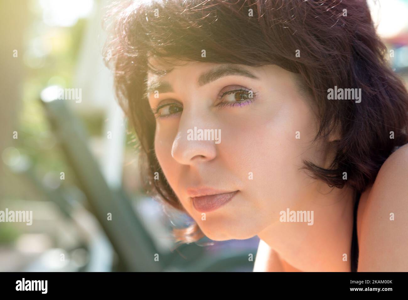 The woman looks suspicious. Portrait incredulous brunette woman Stock ...