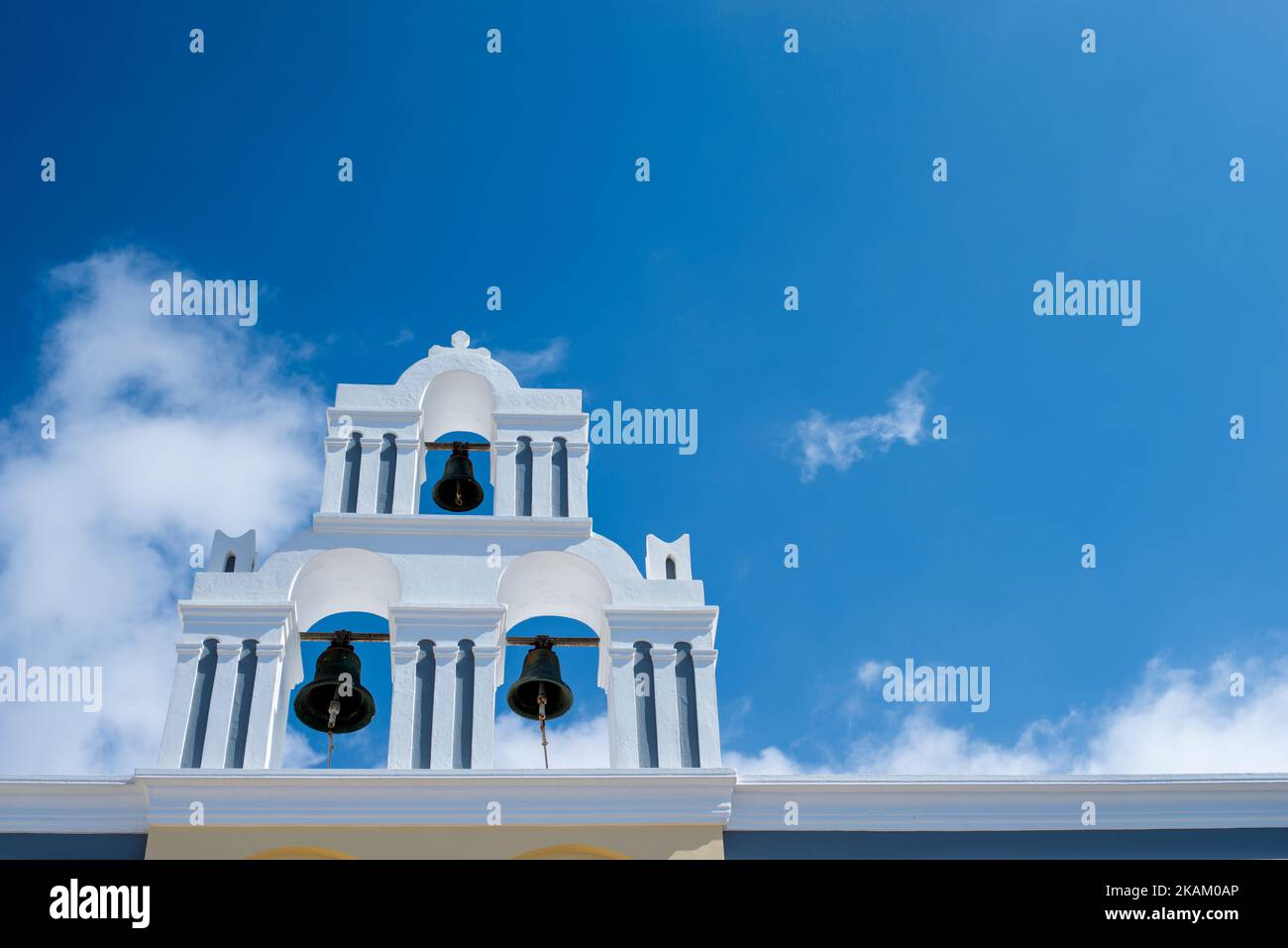 Three bells on a Greek church at Santorini Stock Photo - Alamy
