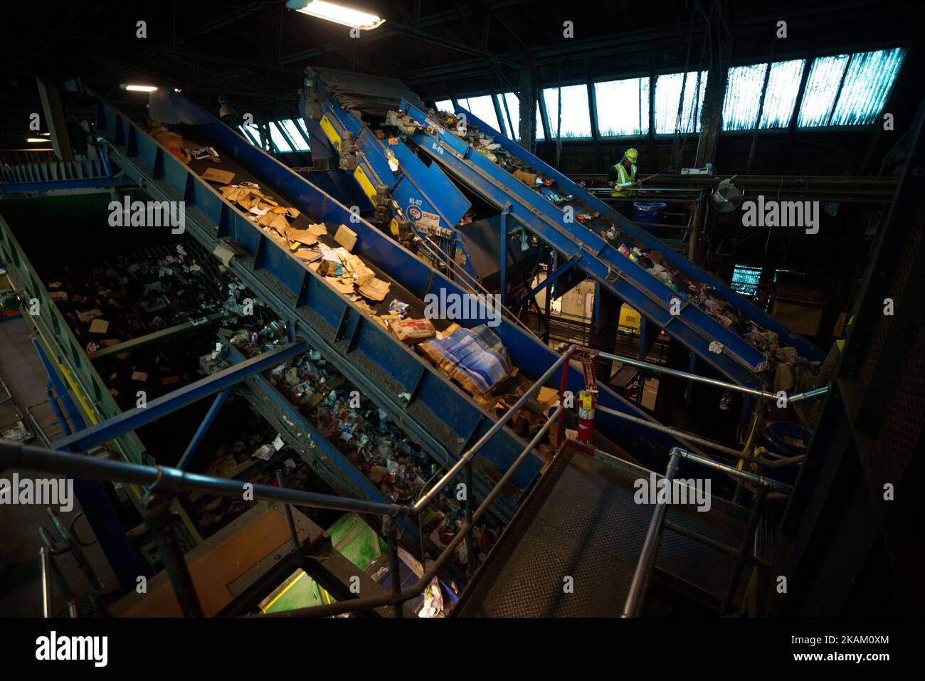 Multiple layers of conveyer belts transport sorted and unsorted ...