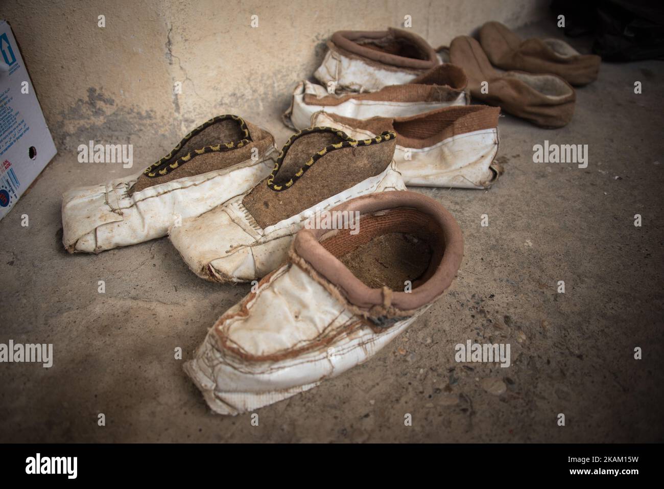 Shoes of Yazidi men on March 2016 in Lalish, Iraq near the border with ...