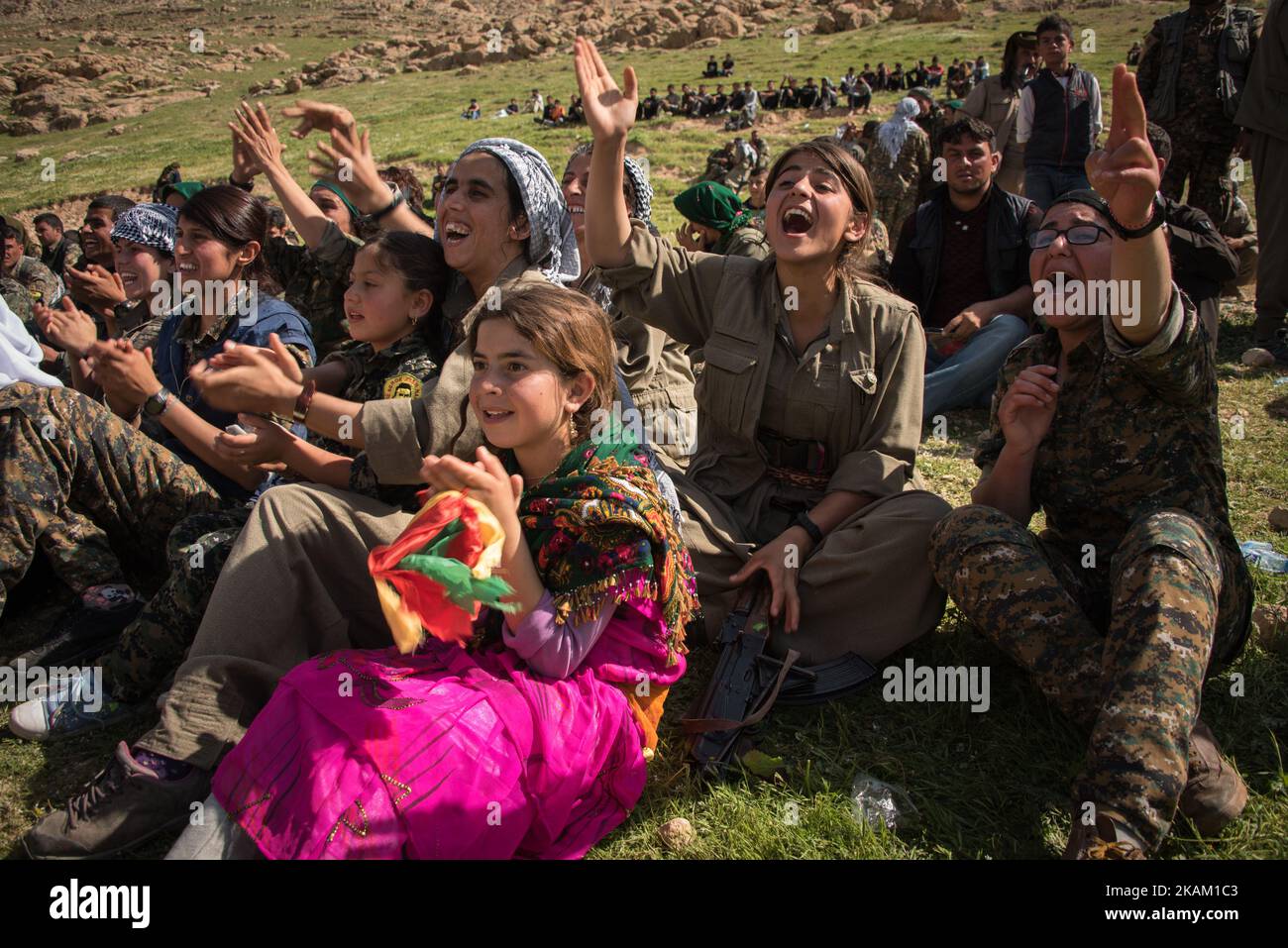 Soldiers with Kurdish militias in Sinjar, Iraq, celebrating the ...