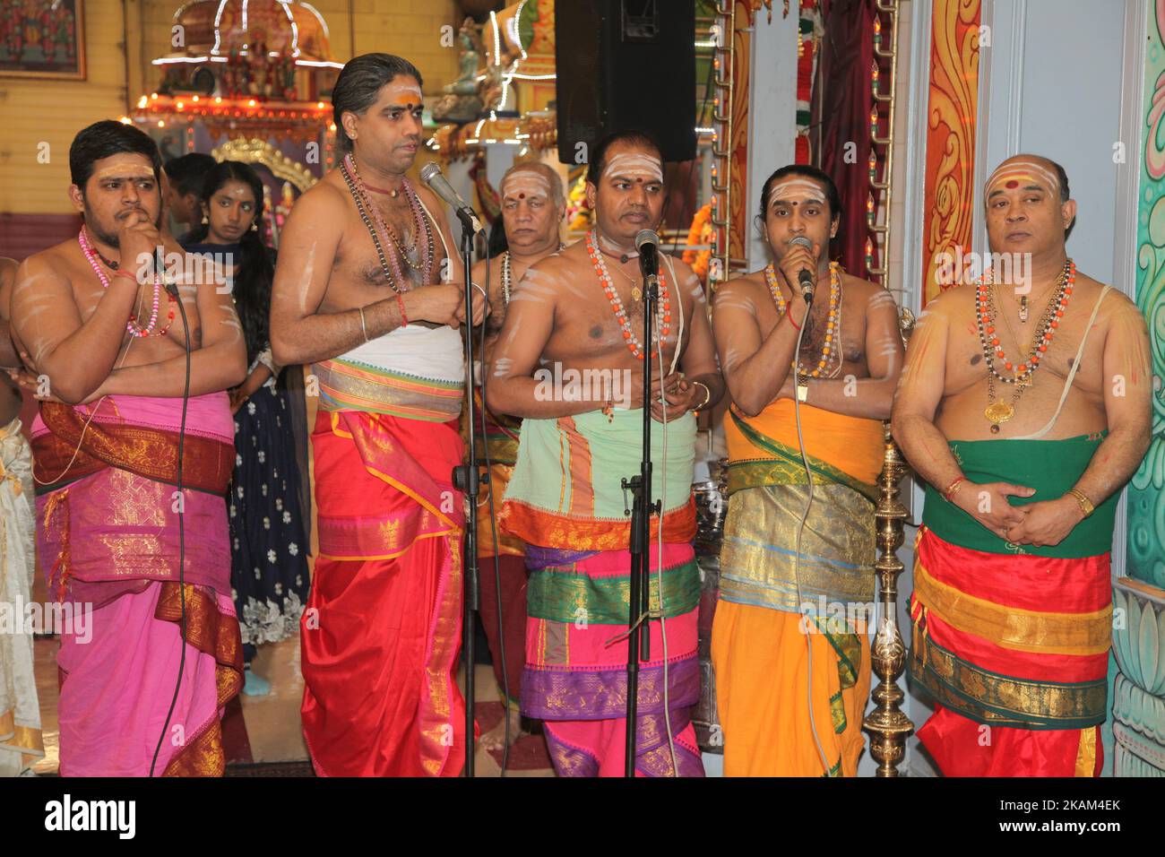 Tamil Hindu priests chanting special prayers during the Masi Magam ...
