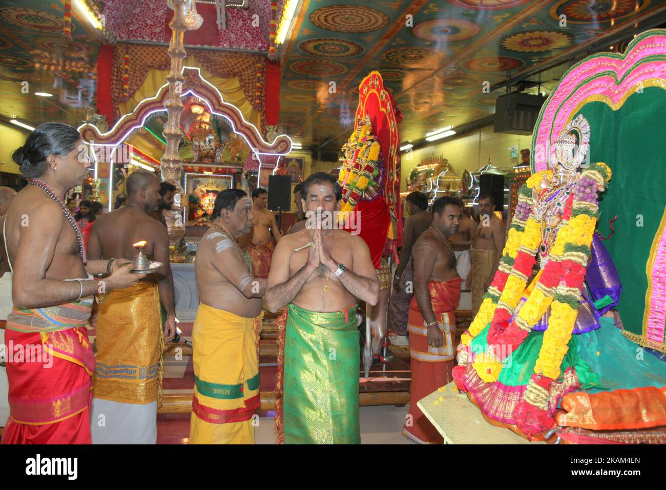 Tamil Hindu priest performs prayers during the Masi Magam Festival at a ...