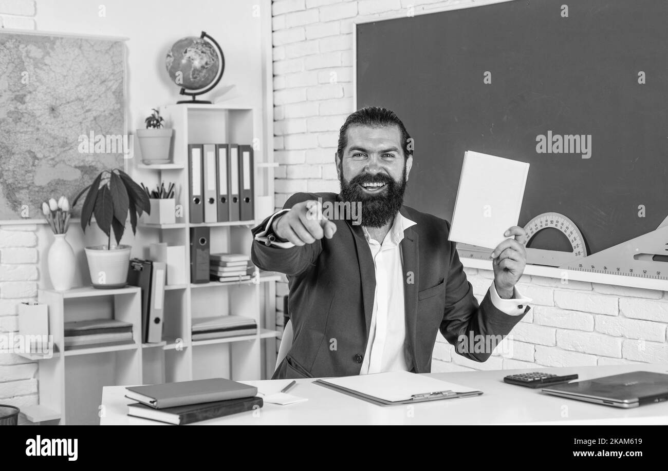 you will answer. male student sit in classroom while lesson. pass the ...