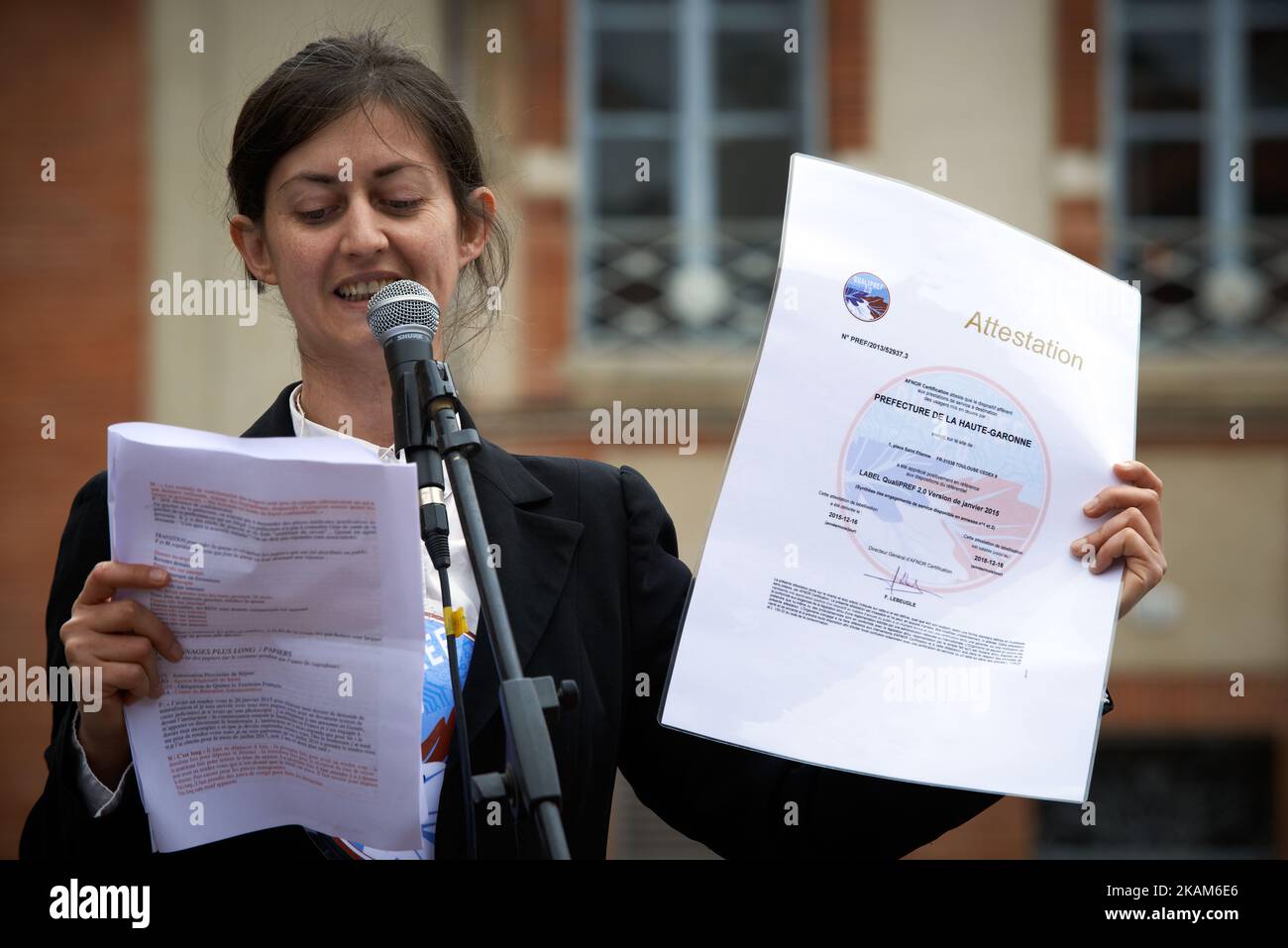 An actress shows the certificate of good reception at the Prefecture of ...