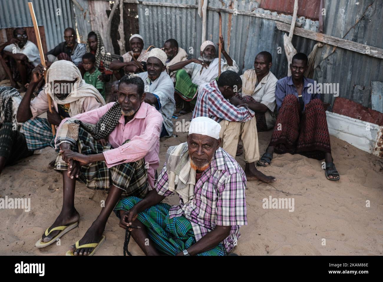 MOGADISHU, SOMALIA - MARCH 25, 2017 - Group of dispalced men who ...