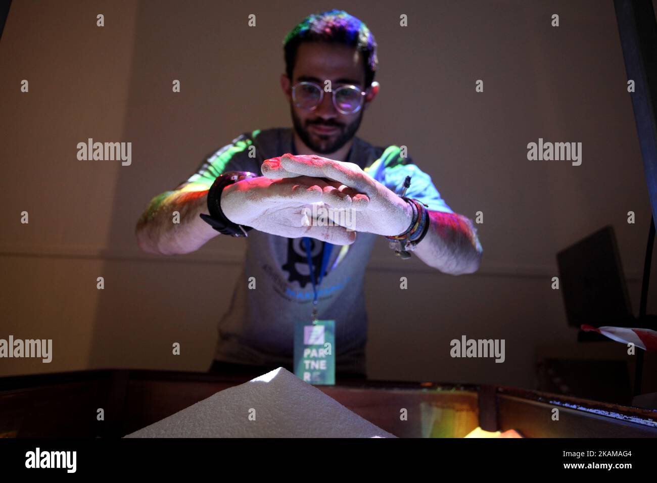 Augmented reality sandbox allows users to create topography models by ...