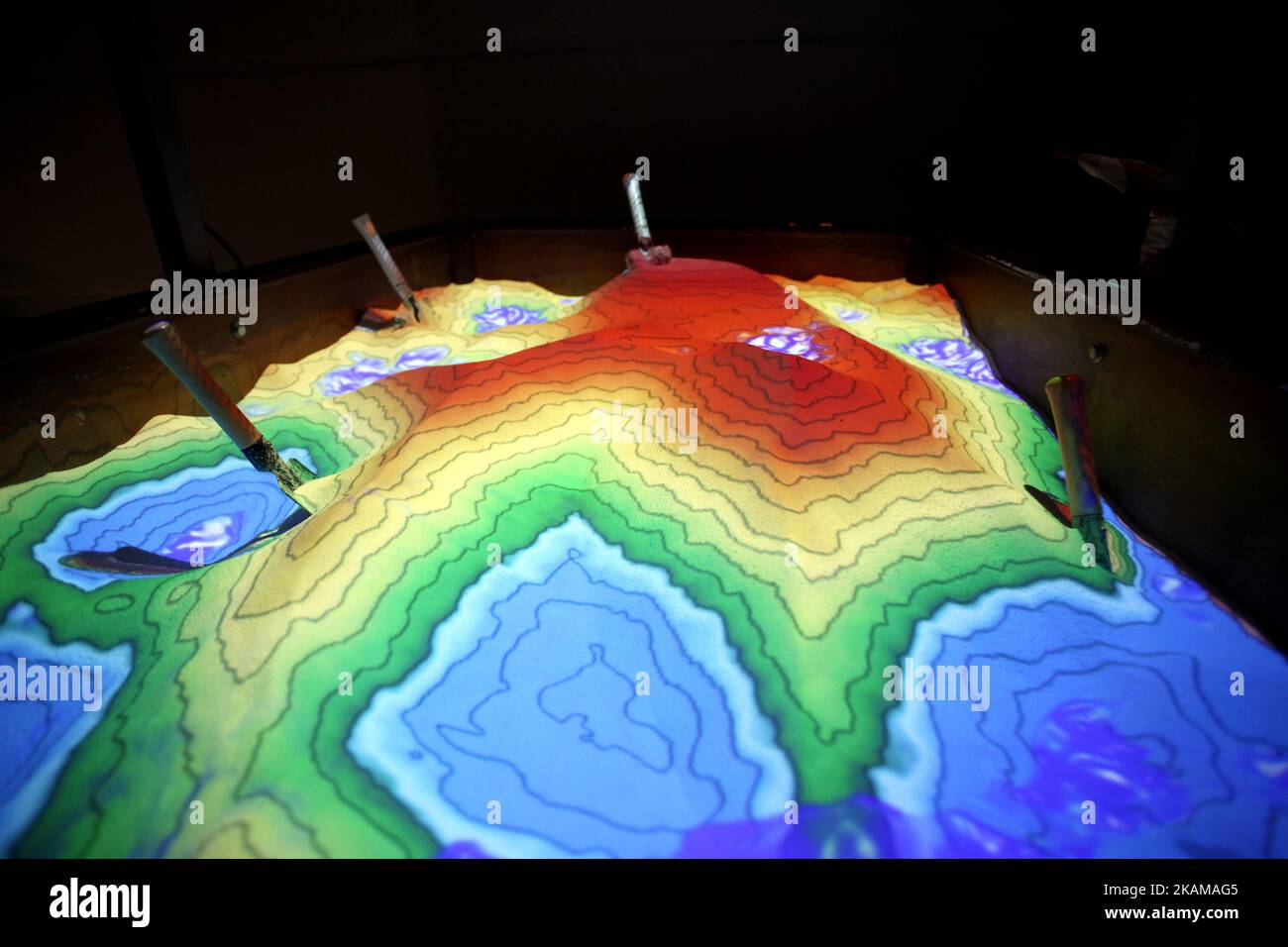 Augmented reality sandbox allows users to create topography models by ...